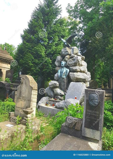 Landscape An Ancient Crypt From A Pile Of Stones A Statue Of A Man In