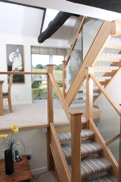 Open Tread Oak Staircase Renovation With Embedded Glass Balustrade
