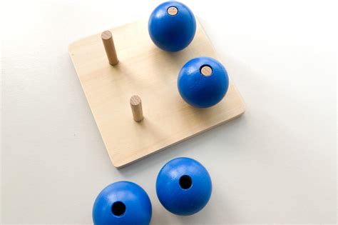 Balls On Small Pegs Montessorily