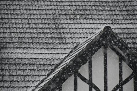 Premium Photo Snow On Roof Of House During Winter