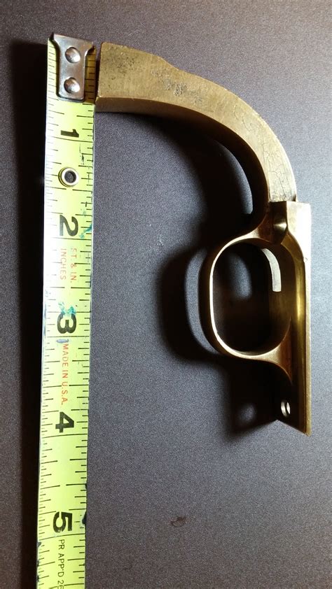 I Need Help Identifying These 2 Brass Trigger Guards The Firearms