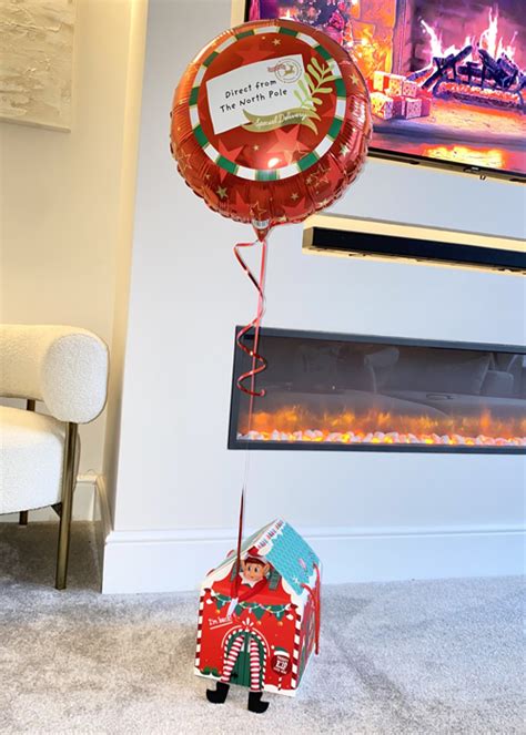 Personalised Naughty Elf Arrival Helium Balloon With House Personalised Naughty Elf Arrival