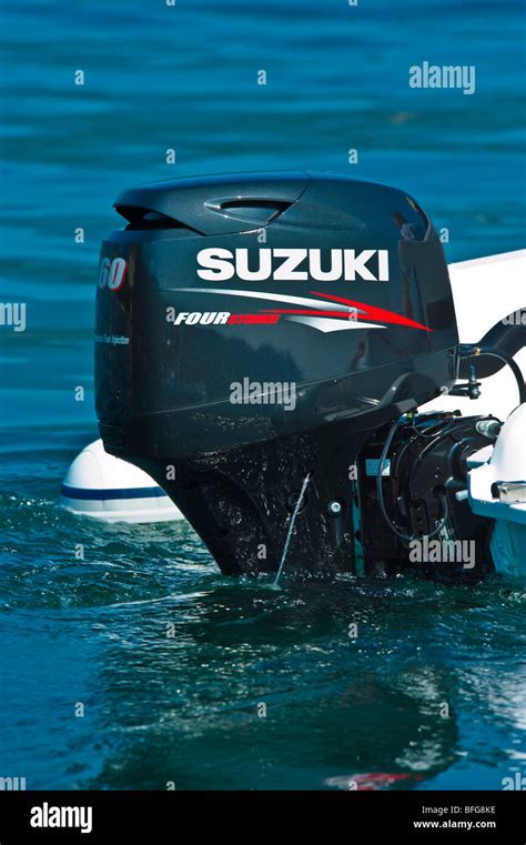 New 2009 Model Of Suzuki Df 60 Outboard Engine On Power Boat Transom