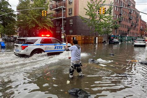 NYC FLOODING New York Begins Drying Out After Being Stunned And