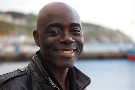 Portrait Of A Smiling African American Man In The Harbour Premium Ai