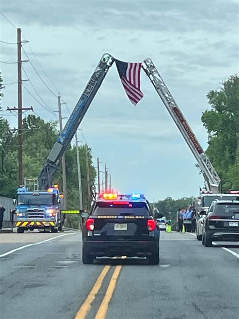 Hundreds Of Law Enforcement Officers Line Route For Fallen Officer