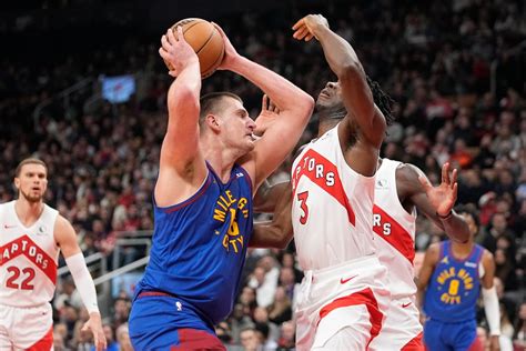 Nikola Jokic Stars Nuggets Handle Raptors Reuters