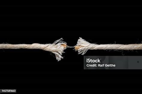 Rope Hangs By A Thread As A Symbol Image For Load Limits Or Risks Stock