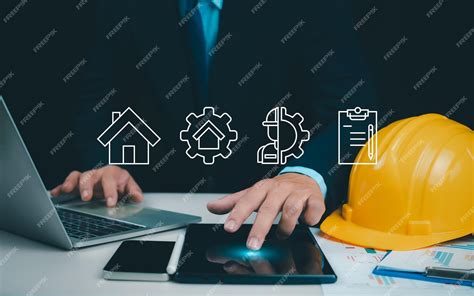 Premium Photo Architect Or Engineer Using Tablet To Work On Table Cost Calculation