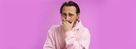 Shocked Upset Young African American Bearded Guy In Red Hoodie Facepalm