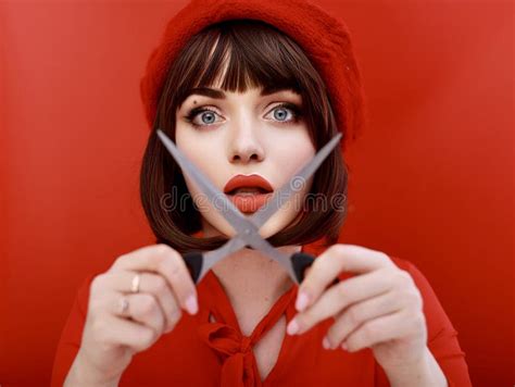 Portrait Of A Girl In Glasses With Scissors In Her Hands Stock Image
