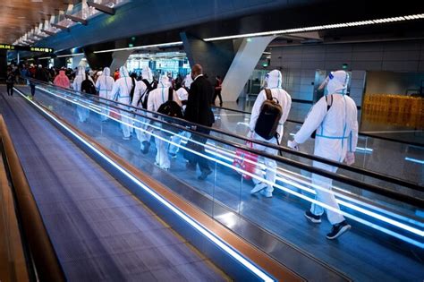 Premium Photo Blurred Motion Of People Walking On Escalator