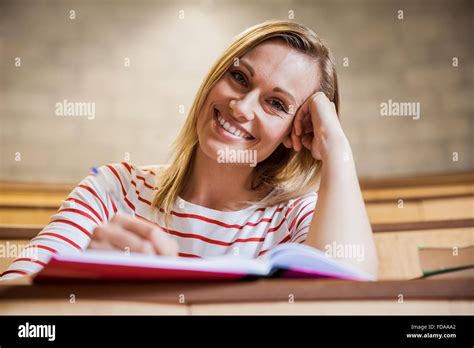 Female Babe Taking Notes In A Class Stock Photo Alamy