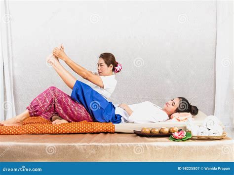 Thai Masseuse Doing Massage For Woman In Spa Salon Asian Beautiful