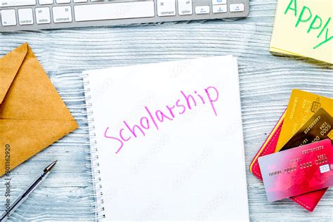 Scolarship Set With Notebook Keyboard And Cards On White Desk Top View