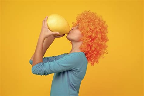 Premium Photo Teenage Girl Hold Citrus Fruit Pummelo Or Pomelo