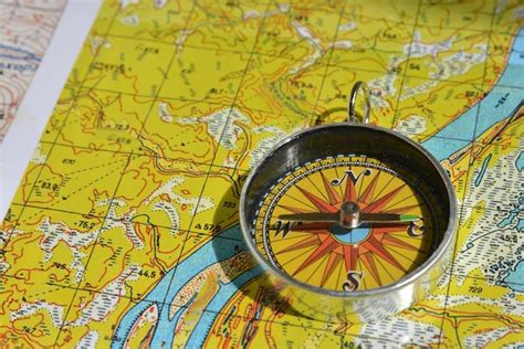 Premium Photo Compass And Map
