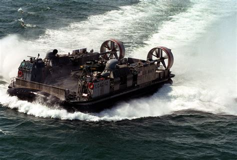 A Marine Corps M 1A1 Abrams Tank Is Carrier Toward The Beach Aboard The