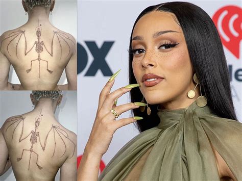 What Does Doja Cats New Bat Tattoo Really Mean Internet Calls It