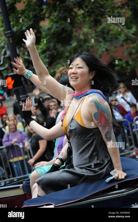Margaret Cho Rides In A Car At The Gay Pride Parade In San Francisco