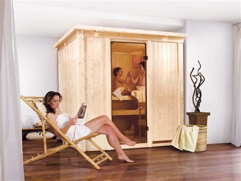 Systemsauna Sodin mit Dachkranz bronzierte Ganzglastür Systemsaunen