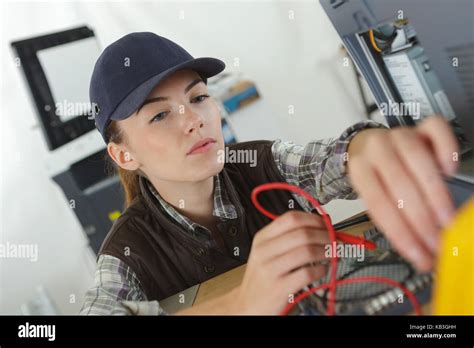 Female Worker Doing Assembly Of Electronic Devices Stock Photo Alamy