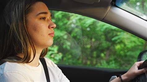 A Young Girl Is Driving A Car An Inexperienced Driver Stock Video