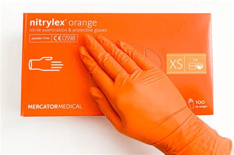Нитриловые перчатки Nitrylex Mercator Medical Xs 5 6 оранжевые 100