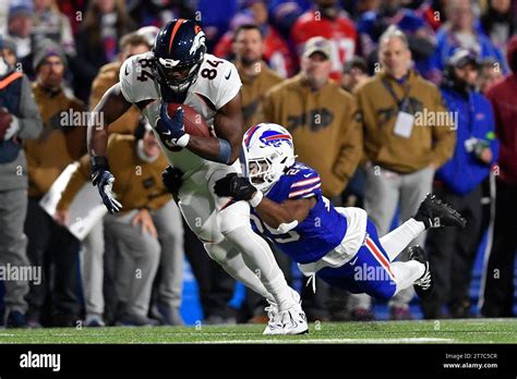Denver Broncos Tight End Chris Manhertz Left Is Tackled By Buffalo Bills Linebacker Tyrel