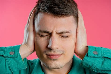 Annoyed Man With Shut Ears On Pink Background Guy Block Annoying
