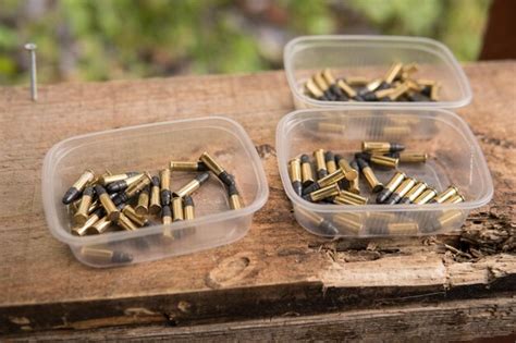 Premium Photo High Angle View Of Bullets In Container On Table