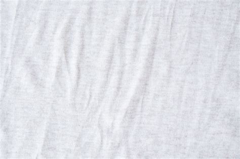 Fondo arrugado de tela de algodón blanco con textura Foto Premium