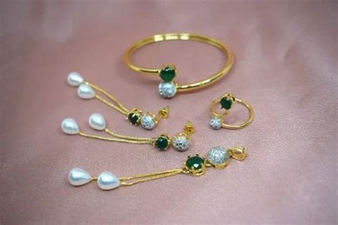 Trendy Alloy American Diamond Gold Plated Jewellery Set Combo At Rs 599