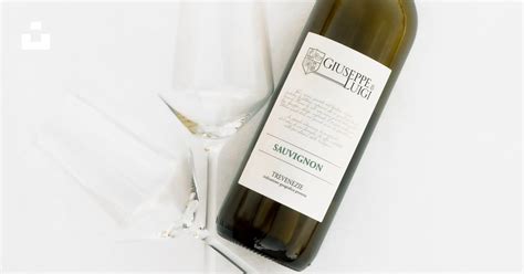 White Labeled Bottle Beside Clear Wine Glass Photo Free Wine Image On