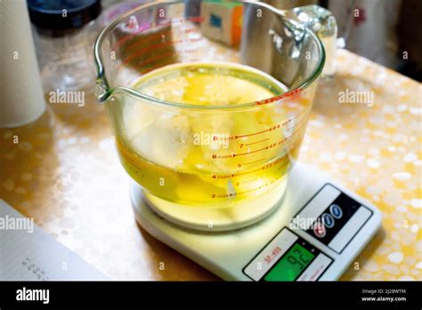 Hot Of Girl Wearing Latex Gloves Blending Oils Using Blender With A