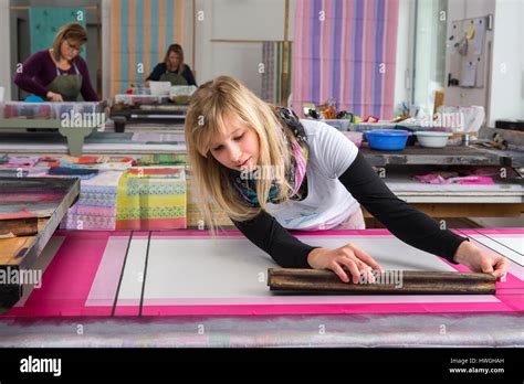 Block Printing Woman Positioning Woodblock On Taut Fabric Panel Two Women At Back Bad Aussee