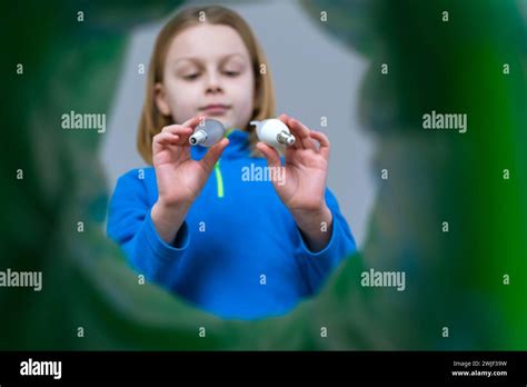 Low Angle View Hands Male Sorting Plastic Bottles In Recycle Bin In Home LED Light Bulbs