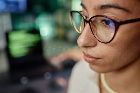 Close Up Of Middle Eastern Female Programmer Wearing Glasses While