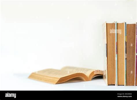 The Book Vertically Arranged And Blur Open Book On Isolate White