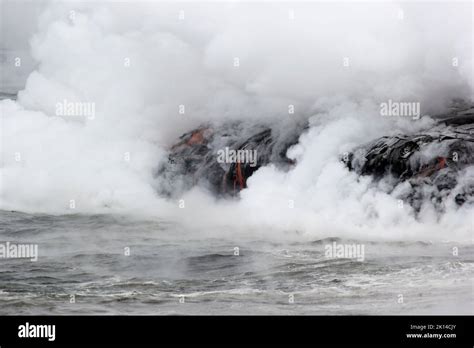 The Lava Glow Of Magma Flowing In The Ocean Volcanic National Park