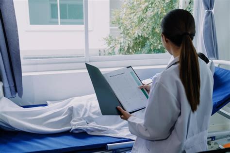 Premium Photo Doctor Check Up After Surgery Doctor Touching Patient