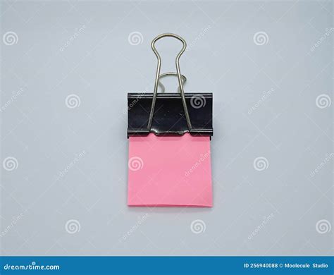 Pink Note Paper With Black Binder Clip Binder Clip And Stack Of Pink