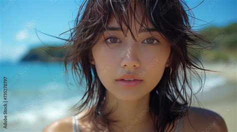 Teenage Asian Woman Posing For A Beautiful Beach Photoshoot In A Bikini