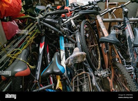 A pile of old used and rusty bikes parked at Geylang, Singapore. Editorial only Stock Photo - Alamy