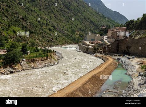 Protective Boundary Wall Built Against A High Flood Water In The River