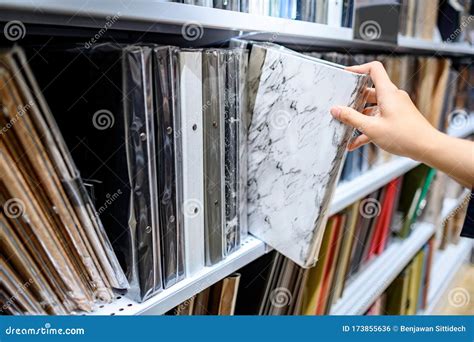 Male Hand Choosing File Folder In Stationery Shop Stock Photo Image Of Picking Ring