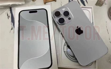 A Photo Of The Iphone 15 Pro And Its Packaging With New Wallpaper Has