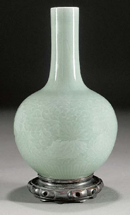 A Chinese Pale Celadon Glazed Bottle Vase Th Century Underglaze Blue Qianlong Seal Mark