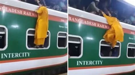 Viral Video Woman Tries To Climb On Train Roof Before Cops Spot Her
