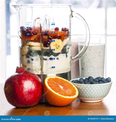 Making Smoothies In Blender With Fruit And Yogurt Stock Image Image